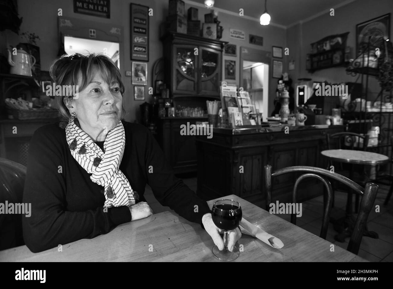 Woman customer in classic retro style cafe restaurant in Colmar Stock ...