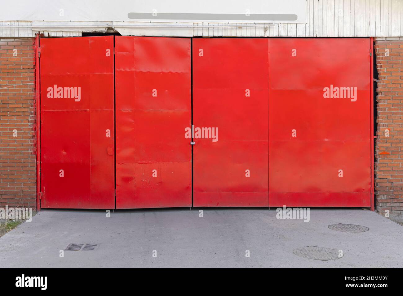 Closed Red Doors at Warehouse Building Exterior Stock Photo - Alamy