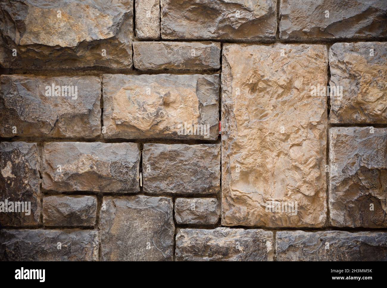 Different size brick masonry. Close up shot. Abstract texture or ...