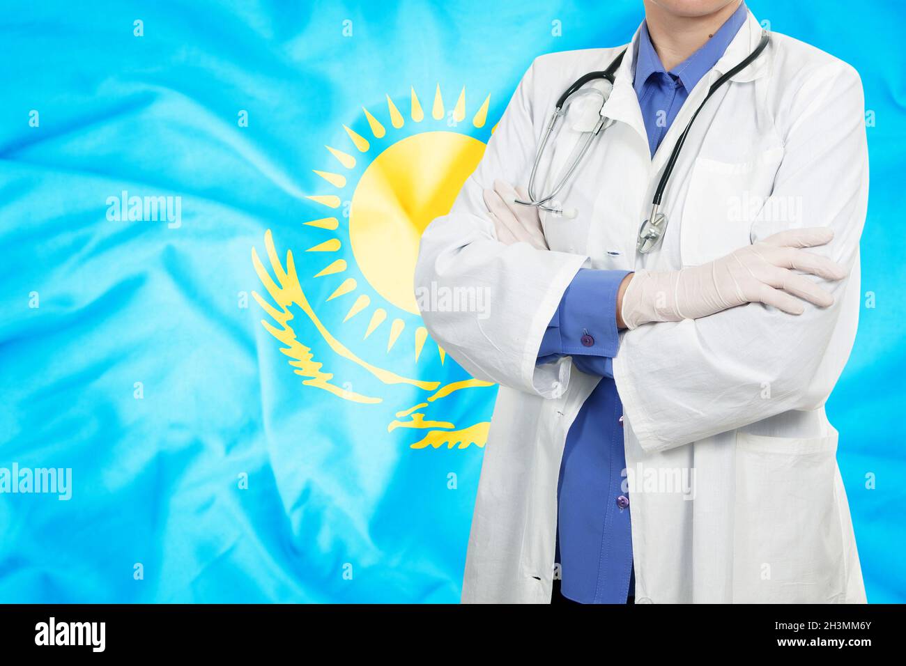 Doctor standing with the flag Stock Photo - Alamy