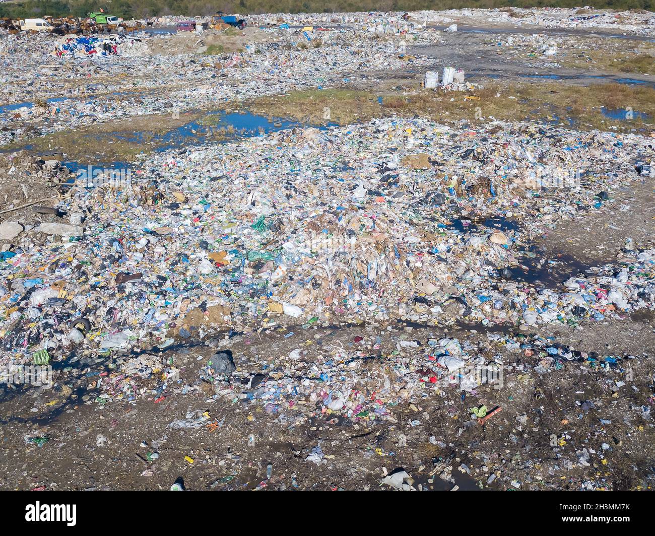 Drone view of a large landfill, a pile of garbage. Household waste in a ...