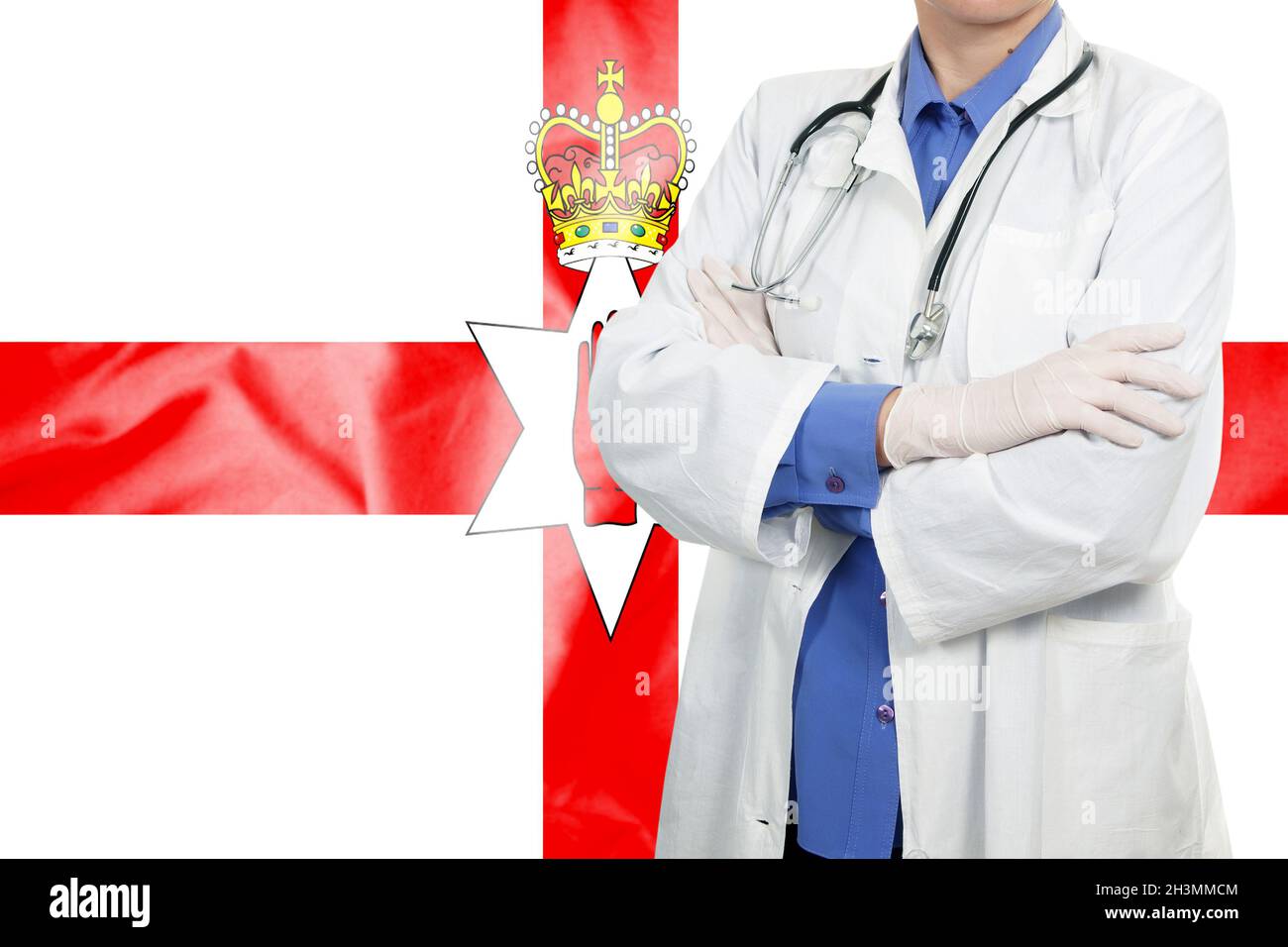 Doctor standing with the flag Stock Photo - Alamy