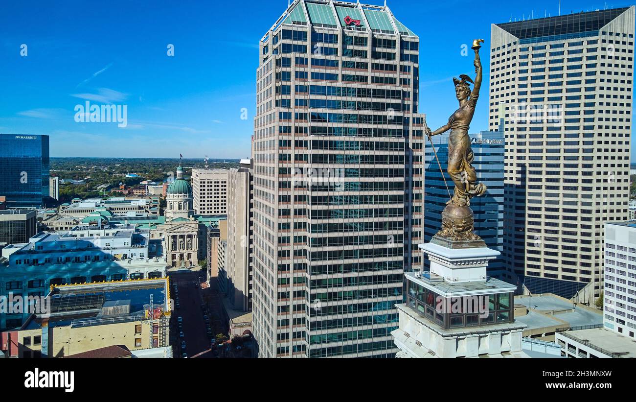 Aerial of Soldiers and Sailors Monument statue at top with downtown ...