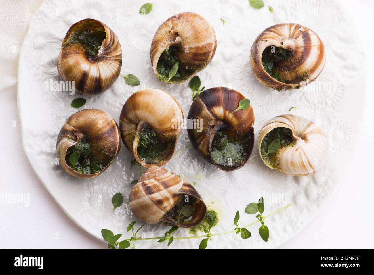 Escargot platter, delicious french delicatessen Stock Photo - Alamy