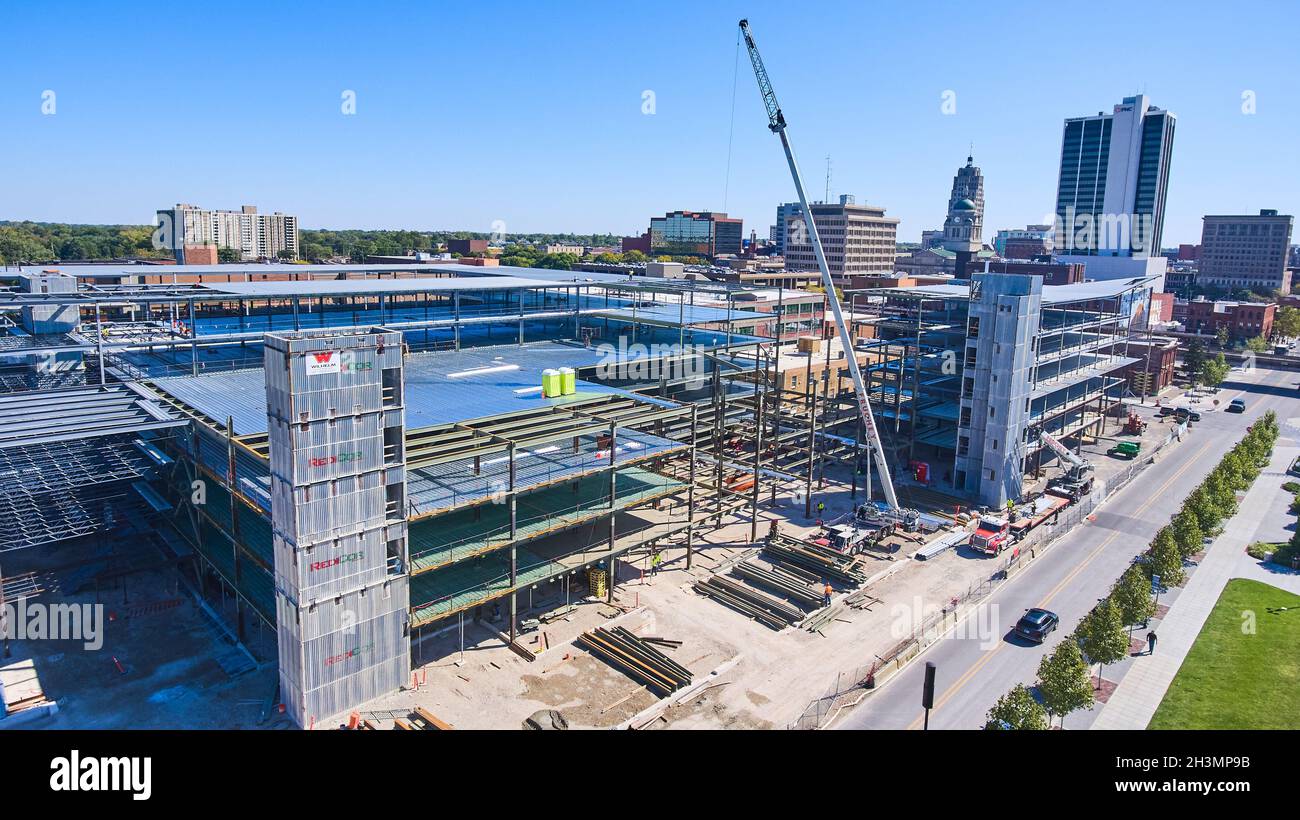 Construction site exterior aerial with downtown Fort Wayne, Indiana in ...