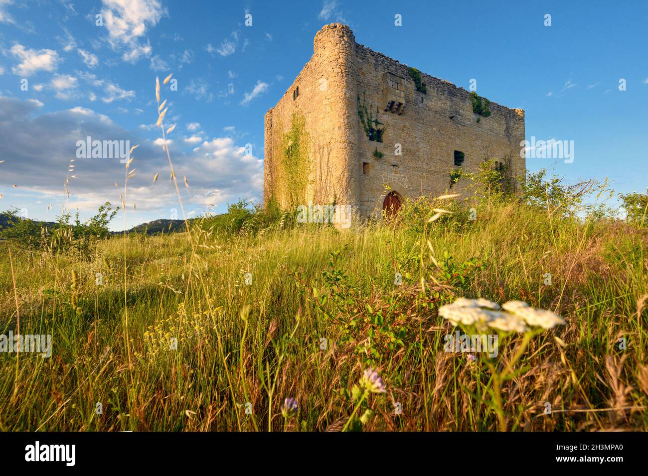 Scenic landscape of a medieval tower at sunset Stock Photo - Alamy
