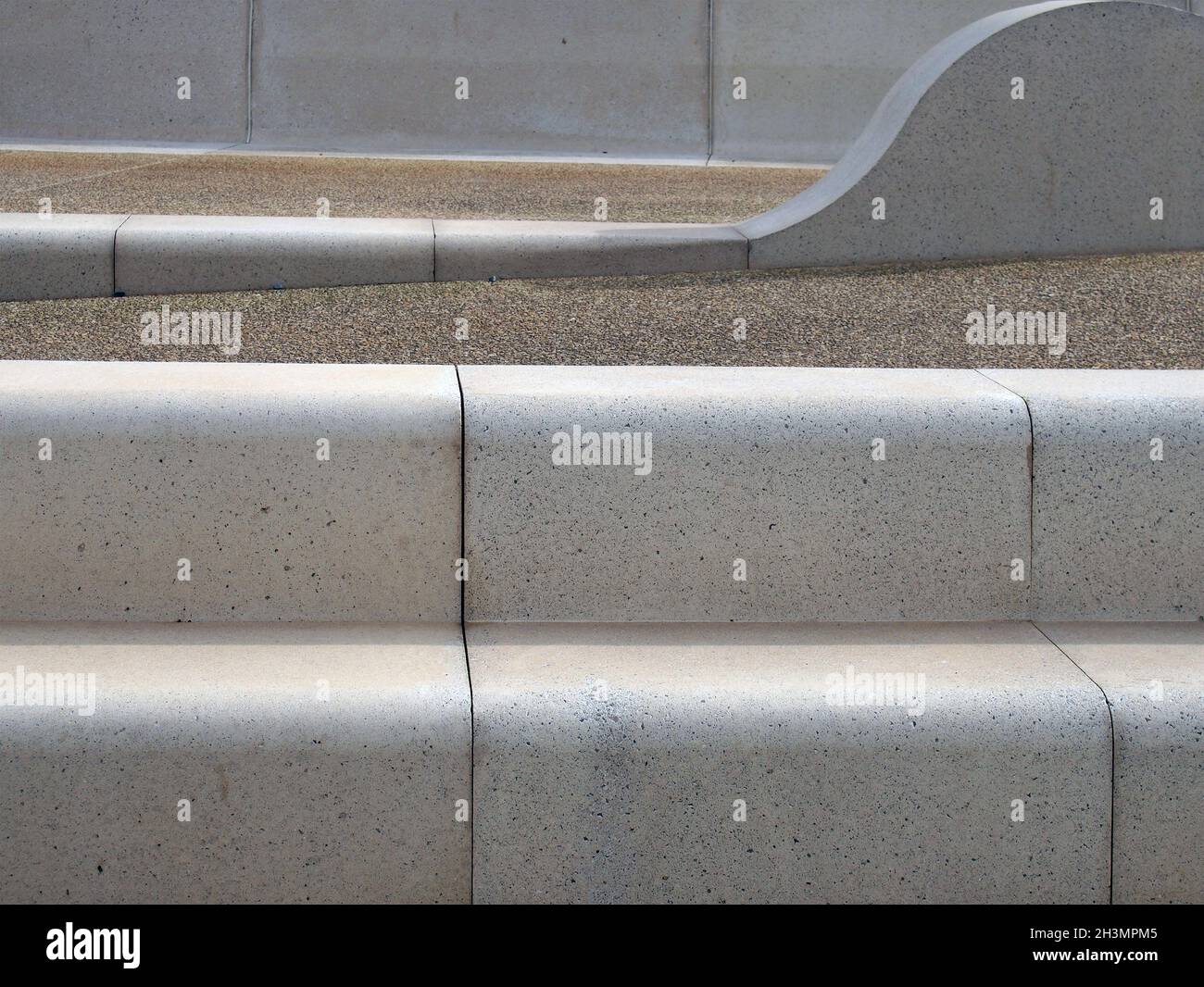 Modern angled outdoor steps with rounded corners int textured grey and ...