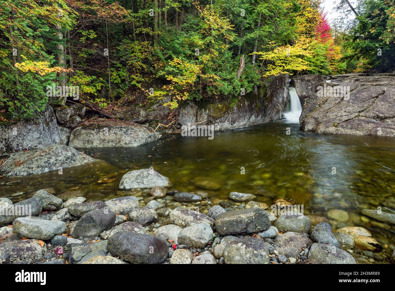 Rocky Falls and Indian Pass Brook in autumn, Essex County ...