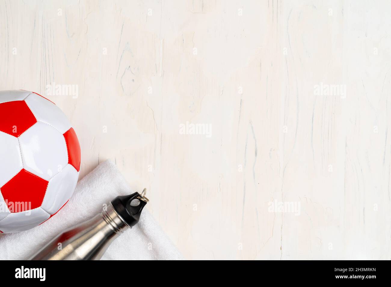Red and white leather soccer ball, top view Stock Photo - Alamy