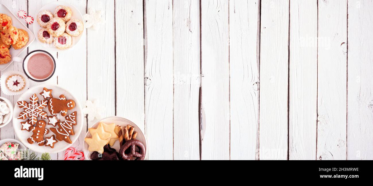 Christmas cookie corner border banner. Top view table scene over a ...