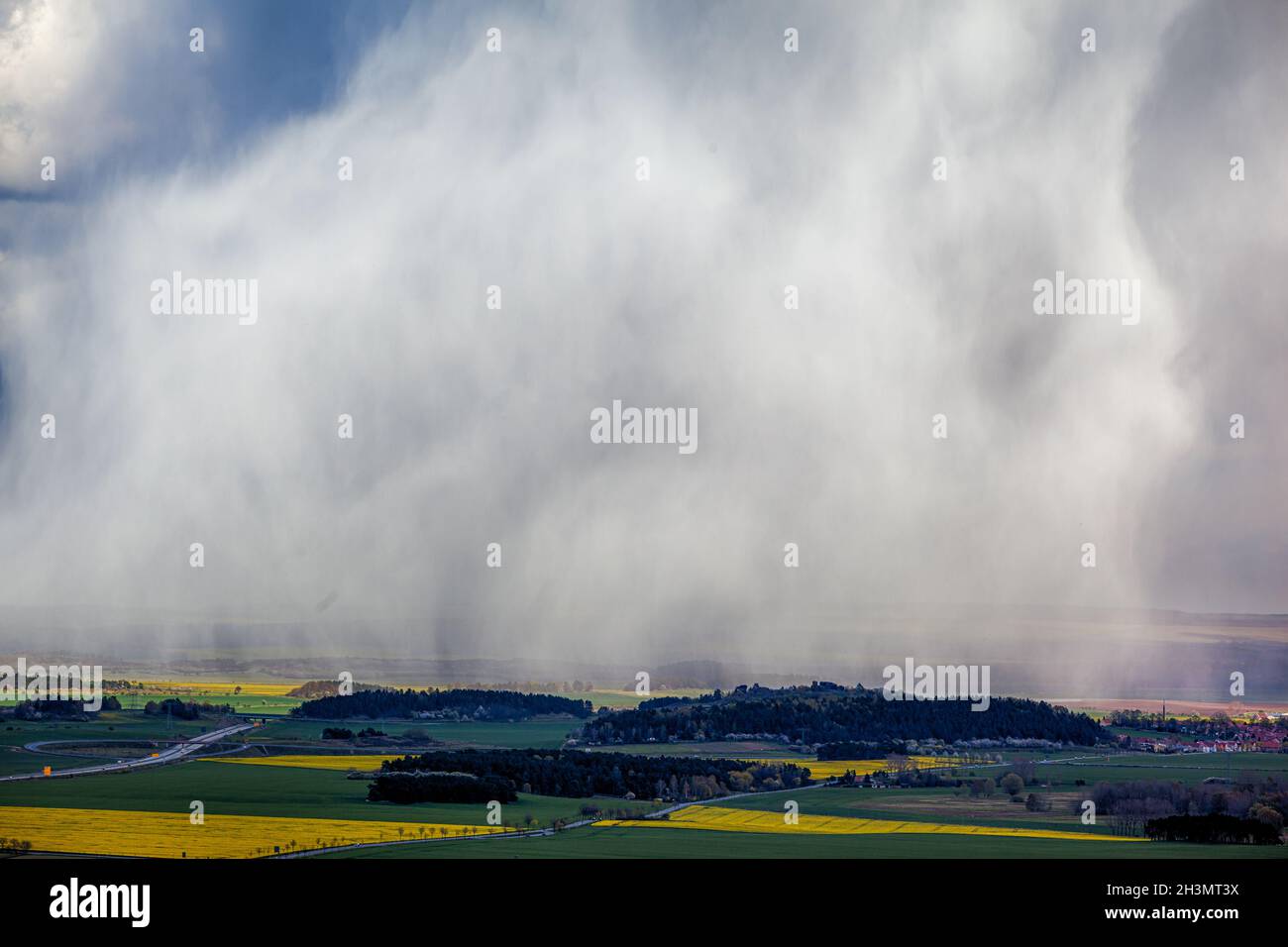 Rain cloud with cloudburst Stock Photo - Alamy