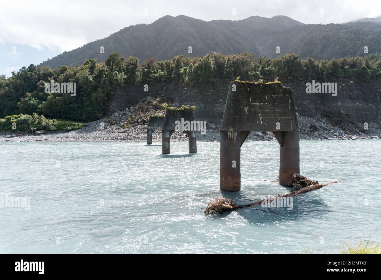 The ruins of bridge over the Whataroa River, New Zealand Stock Photo ...