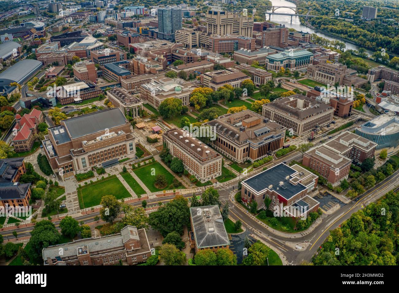 Aerial view of dense buildings and a large public University in ...