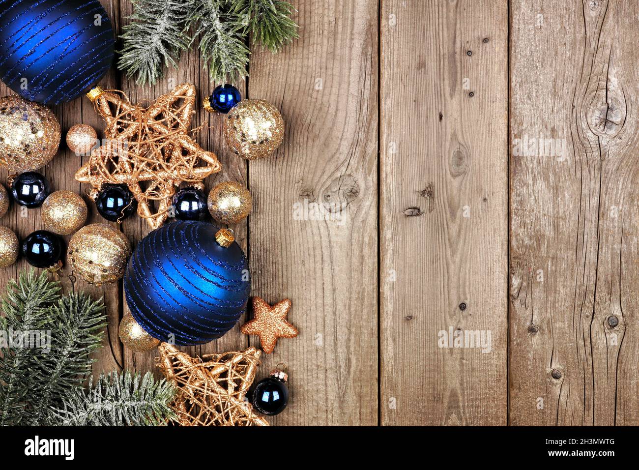 Christmas side border with dark blue and gold ornaments and tree ...