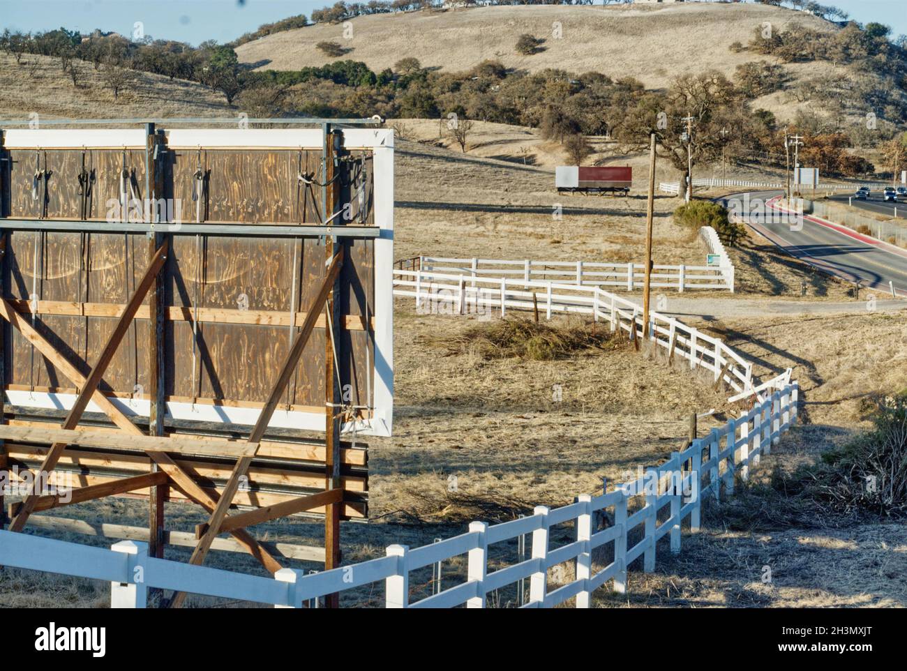 Back of a wooden billboard in a rural setting Stock Photo - Alamy