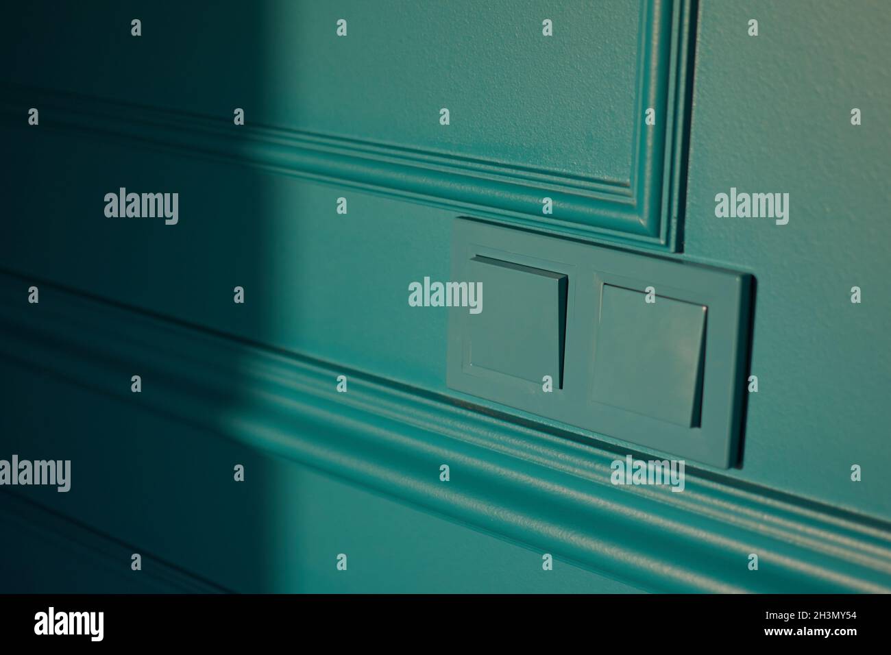 Electrical household navy blue switches in minimalist interior design ...