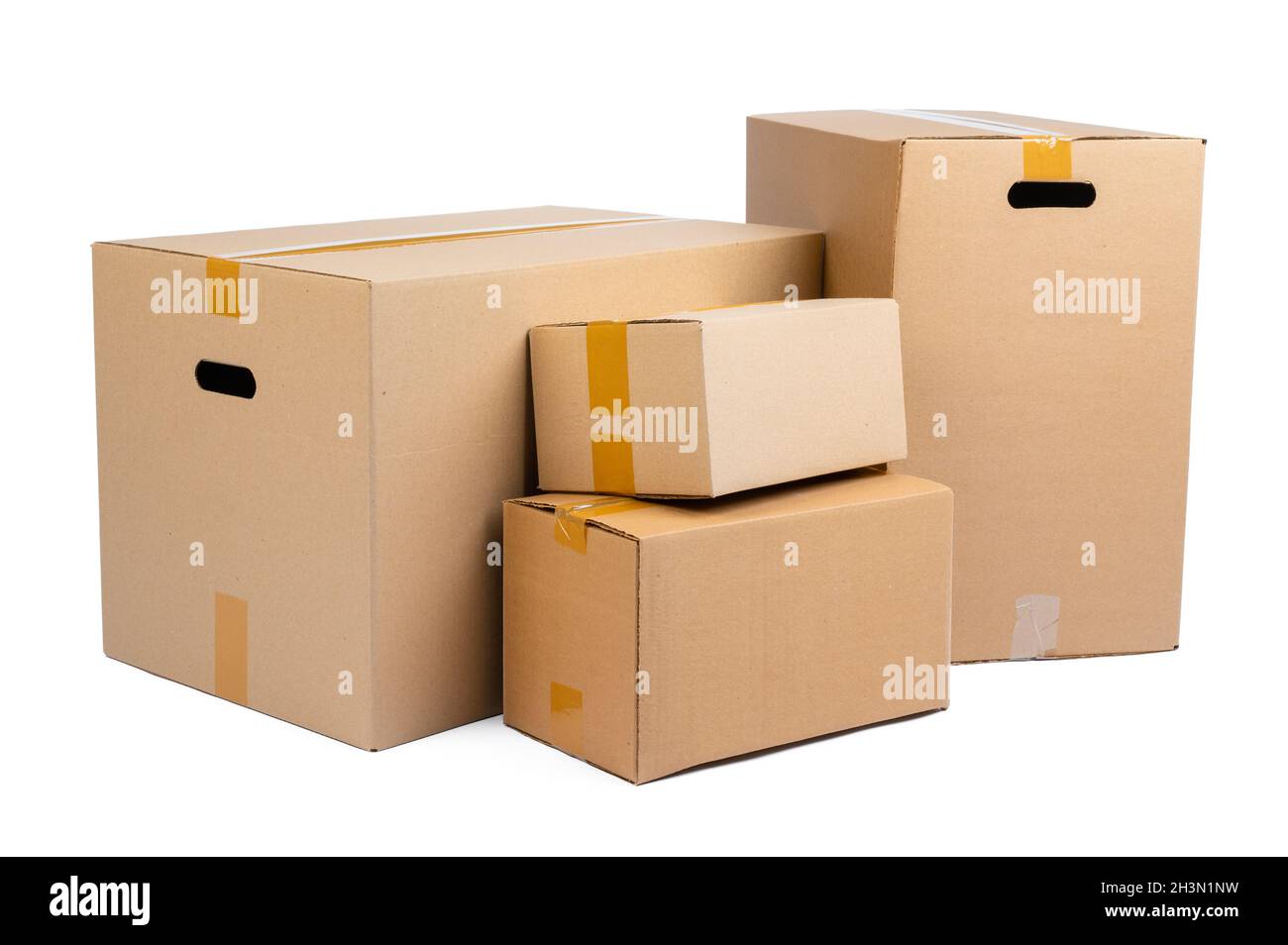Stack of cardboard boxes isolated on white background Stock Photo - Alamy