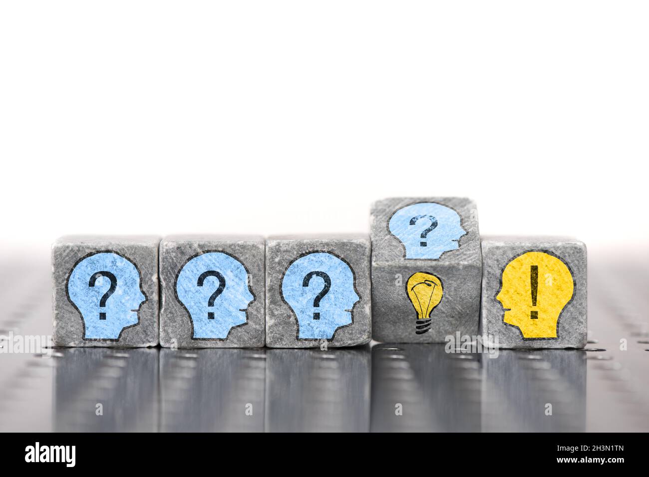 Question and creative ideas printed on stones Stock Photo - Alamy