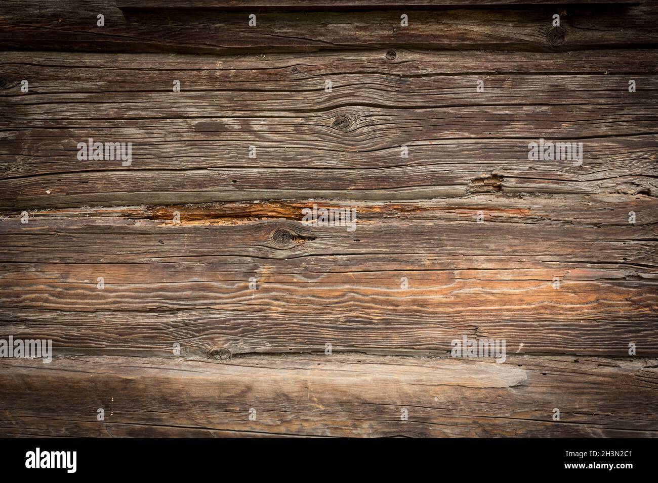 Wooden logs of an old house. Weathered natural gray wood texture ...