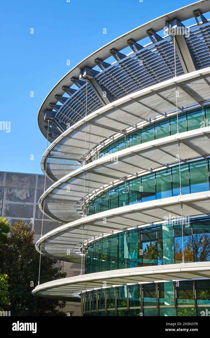 Vertical of round building exterior of glass and steel design Stock ...