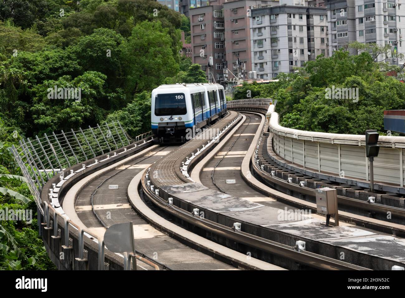 MRT train in city Stock Photo - Alamy