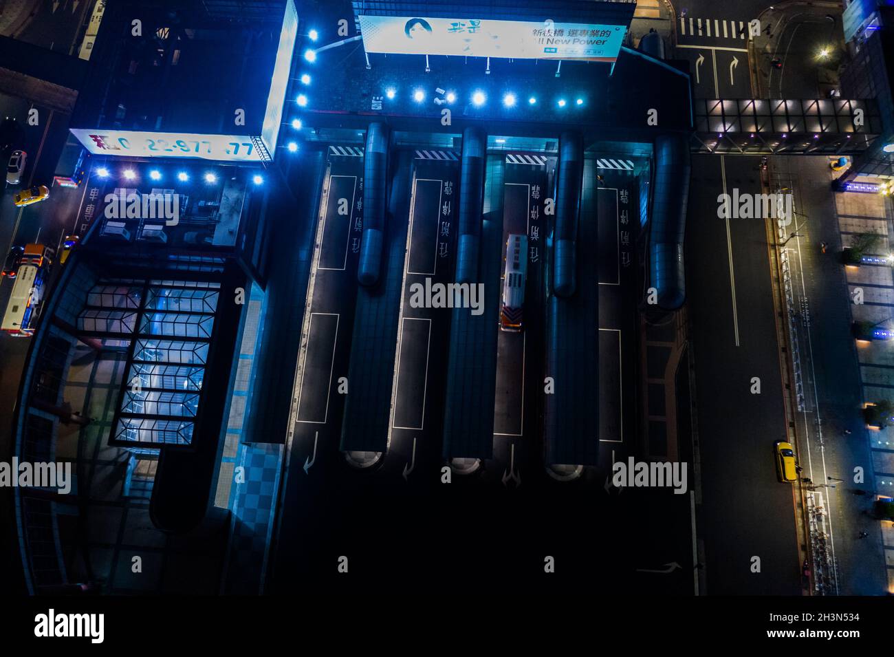 Night scene with bus terminal Stock Photo - Alamy