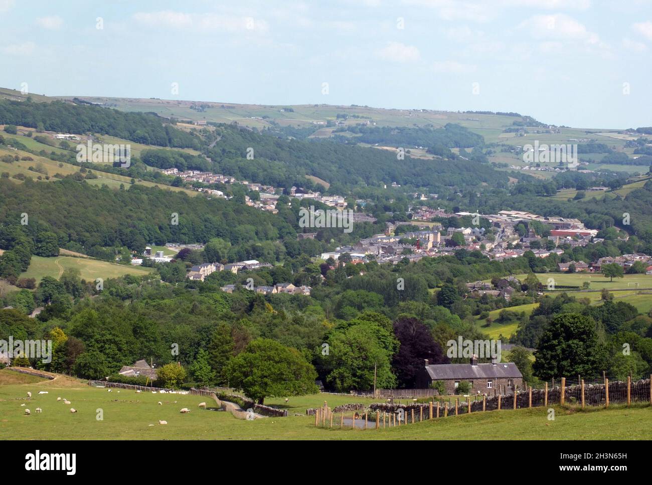 Scenic view of the town of mytholmroyd surrounded by woods and fields ...