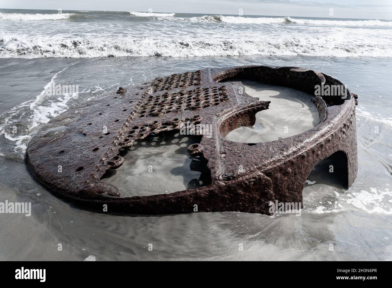 Rusty ship's boiler of SS Lawrence Shipwreck, west coast New Zealand ...