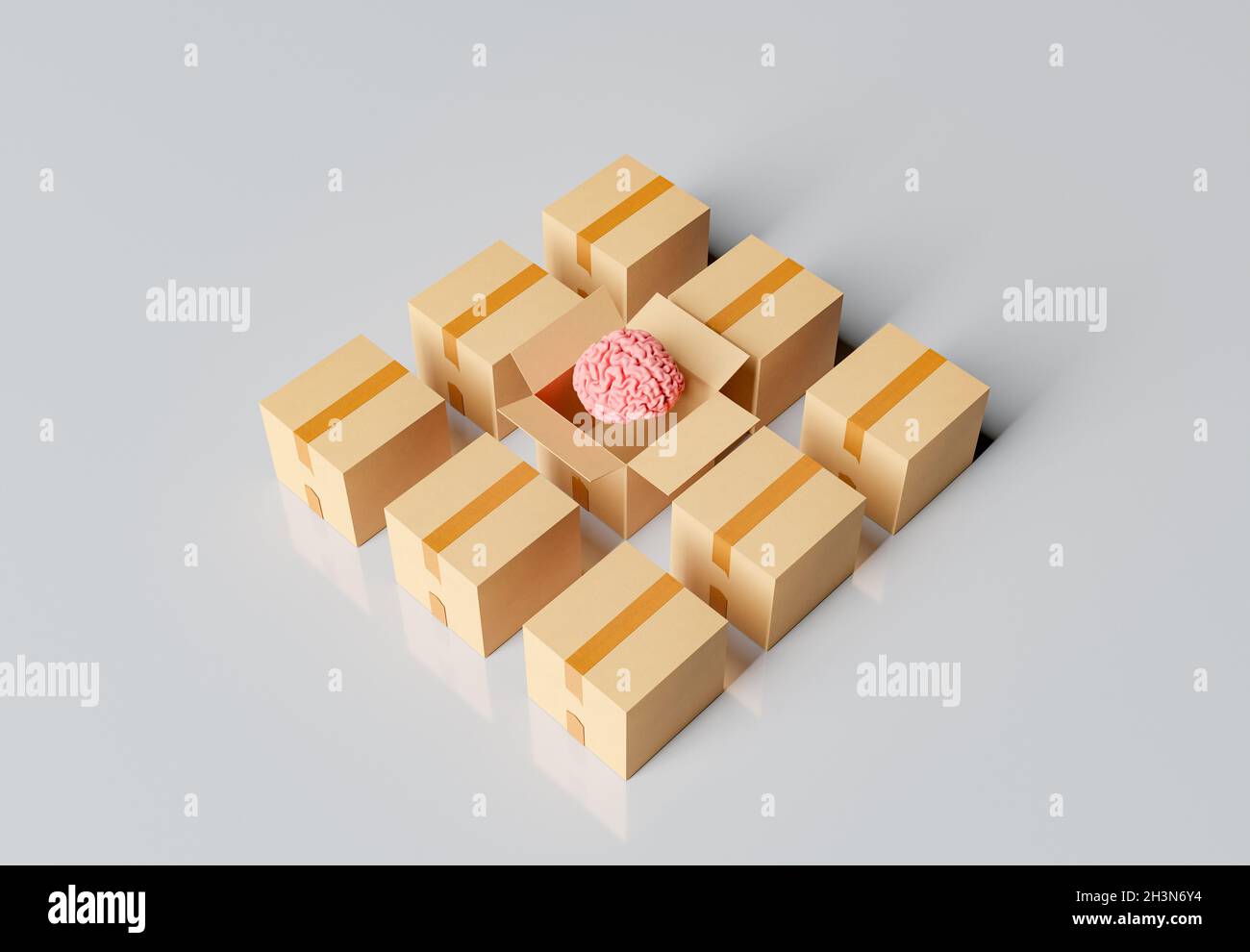 human brain coming out of an open cardboard box surrounded by more ...