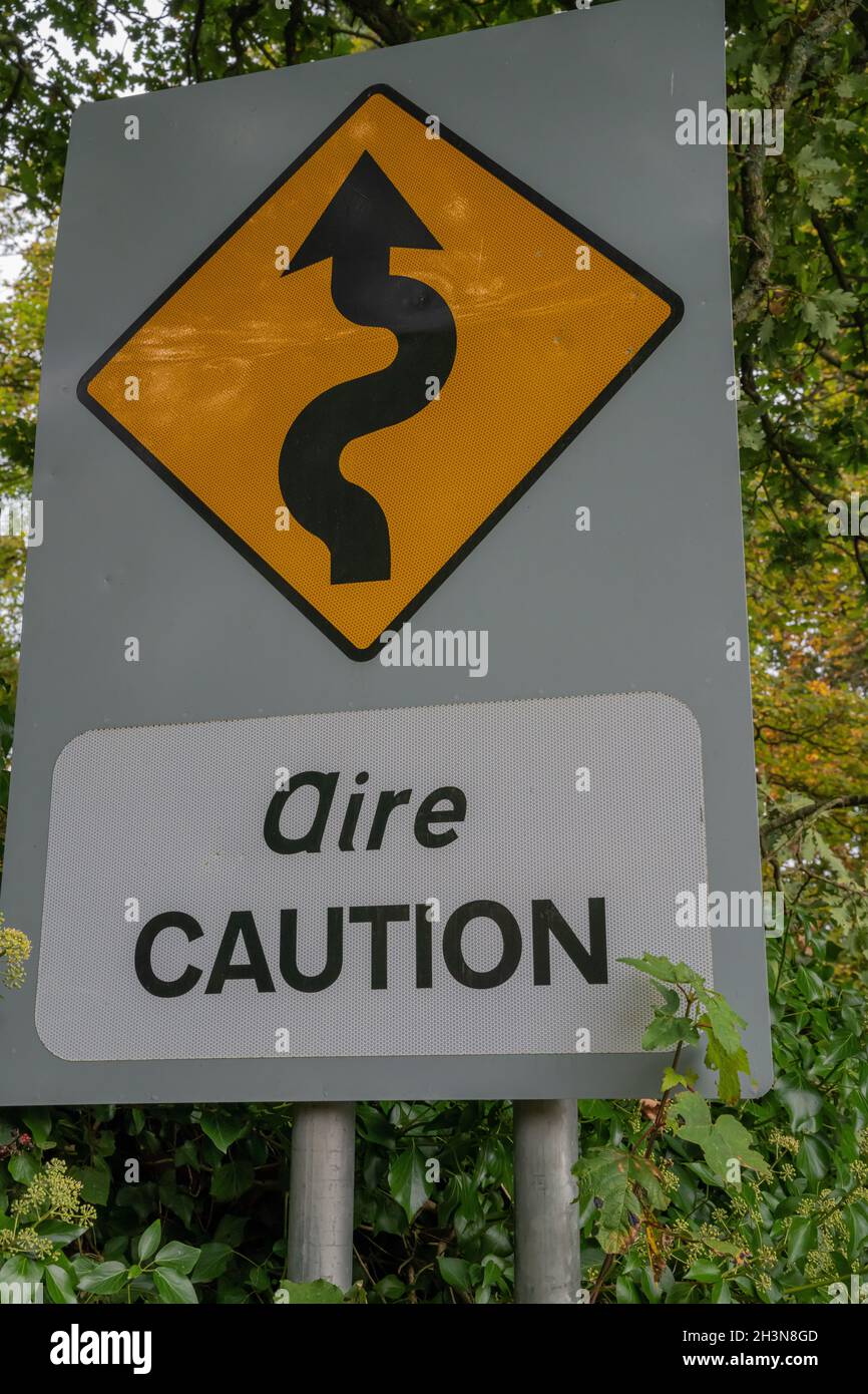 Drivers Caution Sign, Bad bends on road way ahead Stock Photo - Alamy
