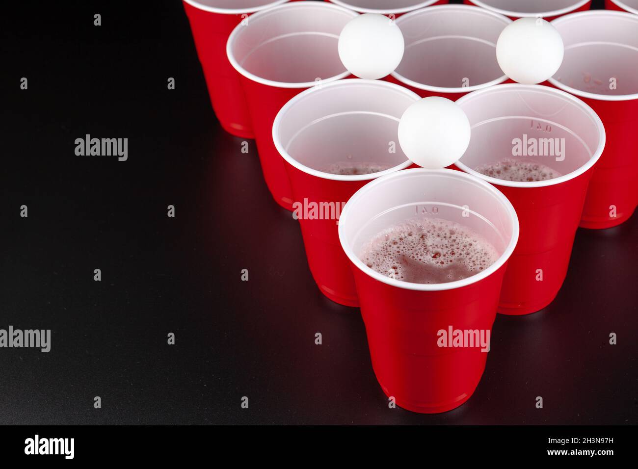 The arrangement of red plastic cups for game of beer pong Stock Photo ...