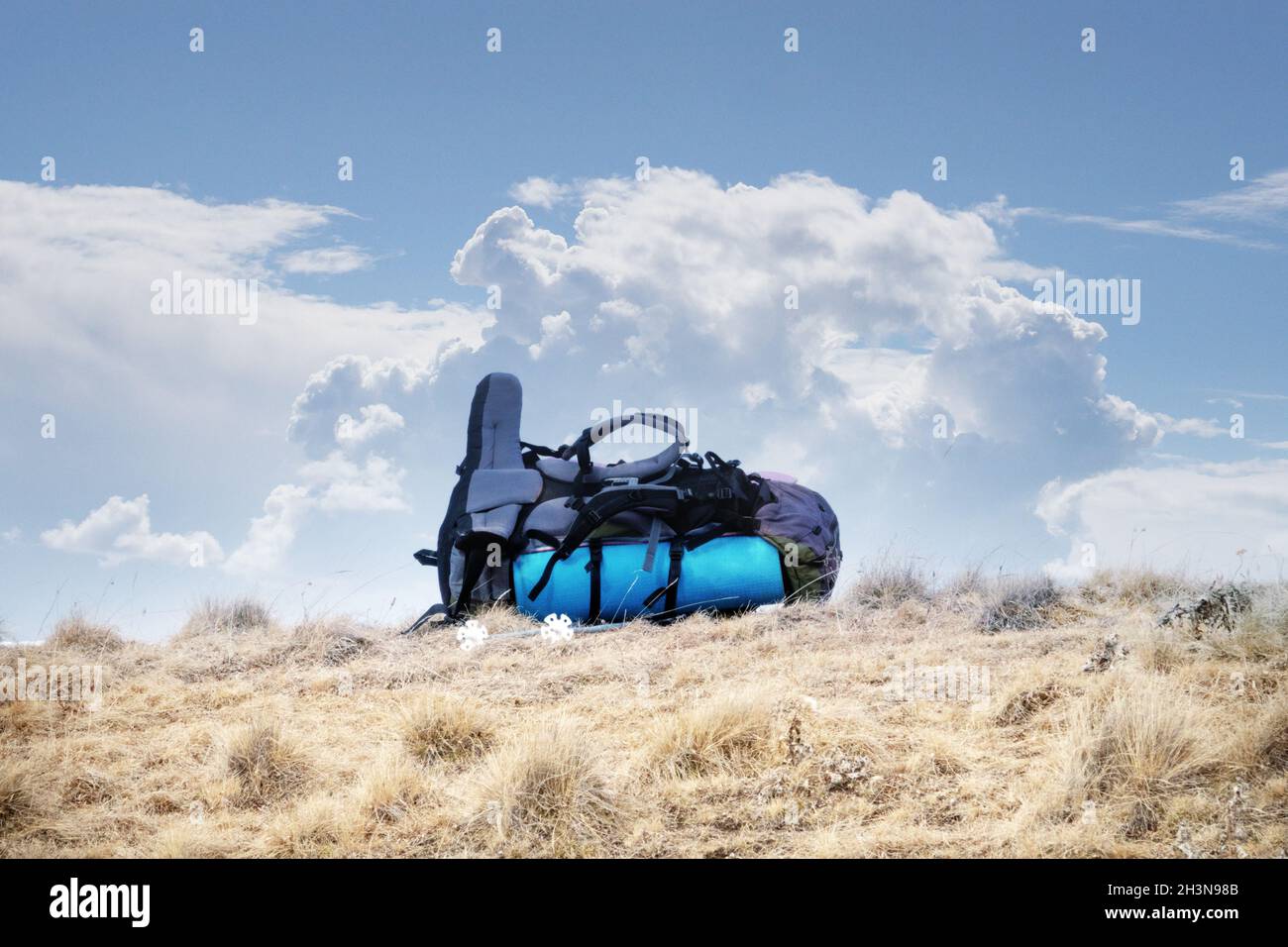 Big backpack in winter in mountains on a halt Stock Photo - Alamy