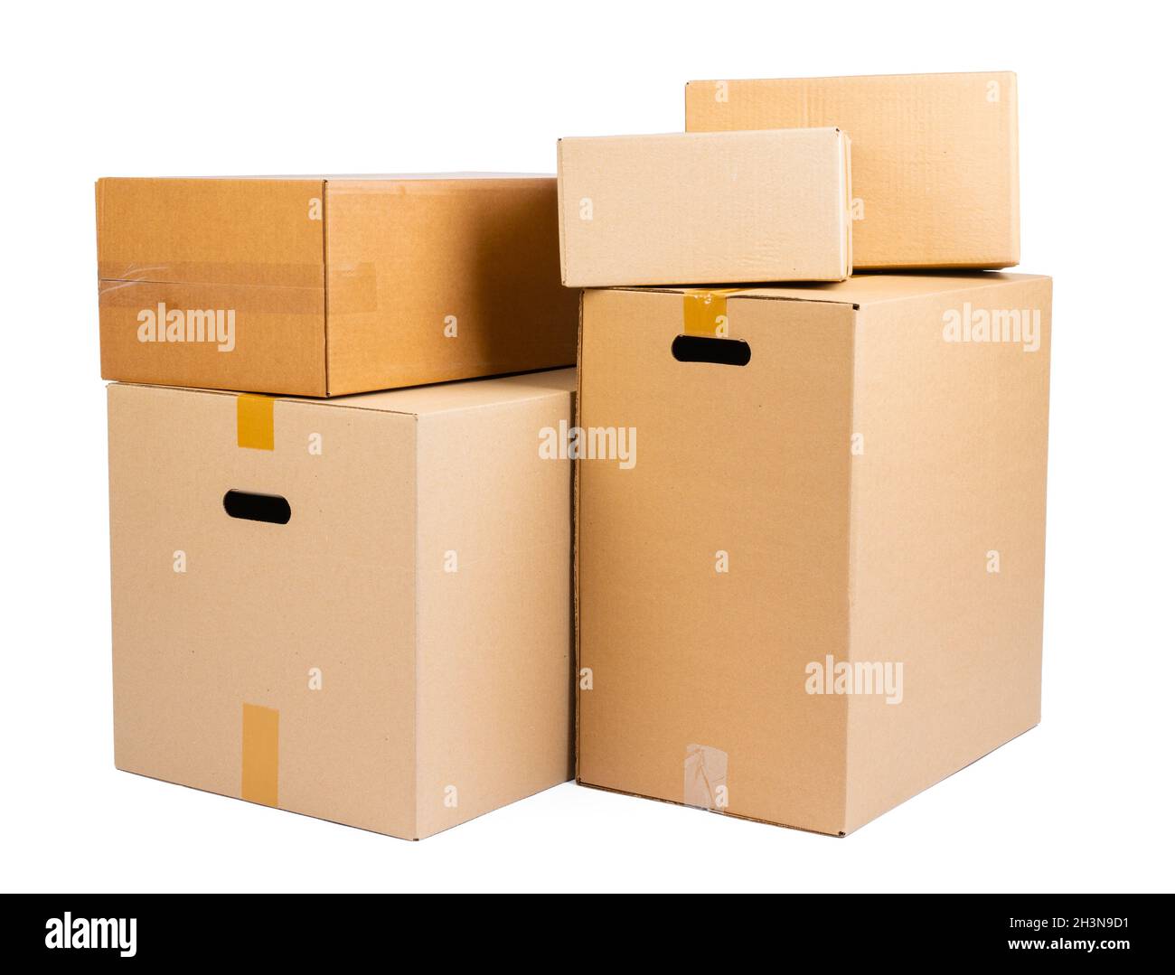 Stack of cardboard boxes isolated on white background Stock Photo - Alamy