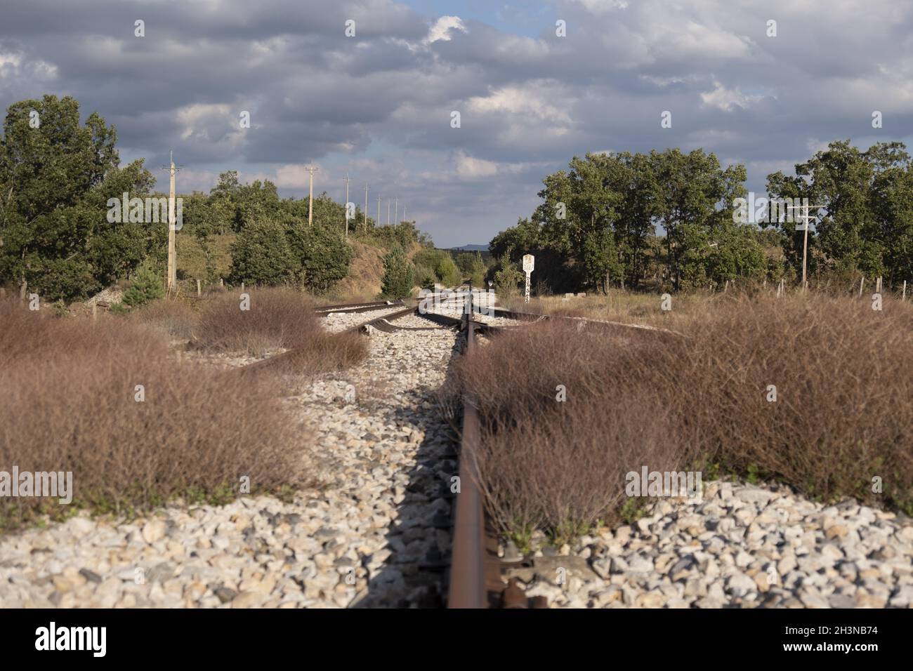 Landscape of beautiful railways on a cloudy day Stock Photo - Alamy