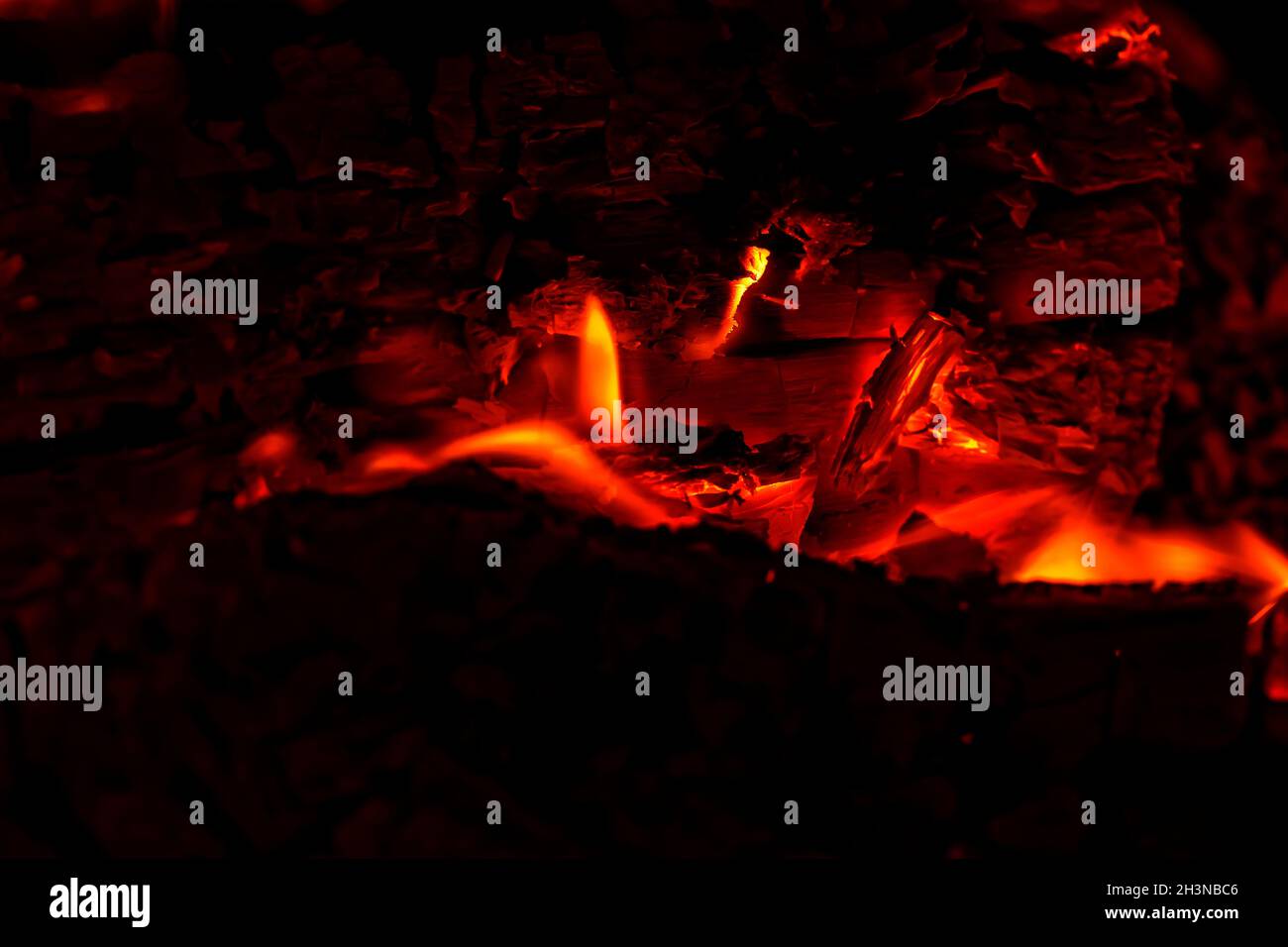 A detail of the embers of a wood fire Stock Photo - Alamy