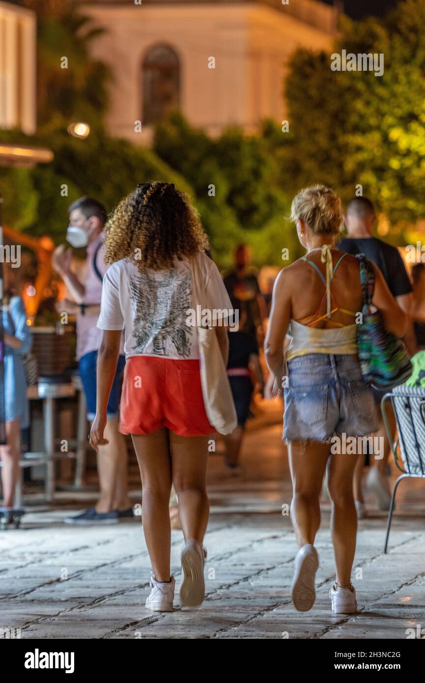 two young females on a night out on the town in zante zakynthos on a ...