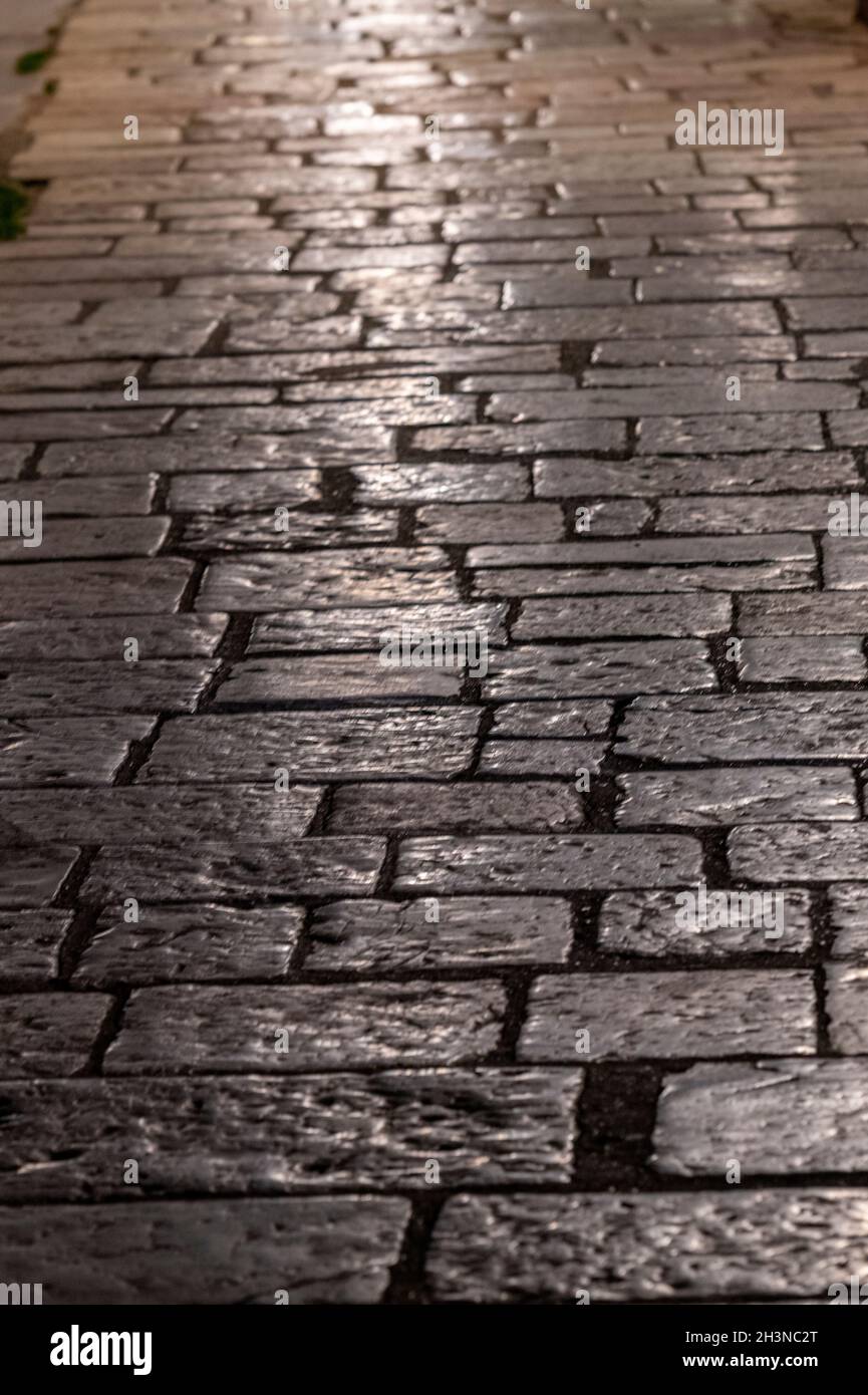 wet cobbles or cobbled street, mysterious, wet roadway, wet pavement ...