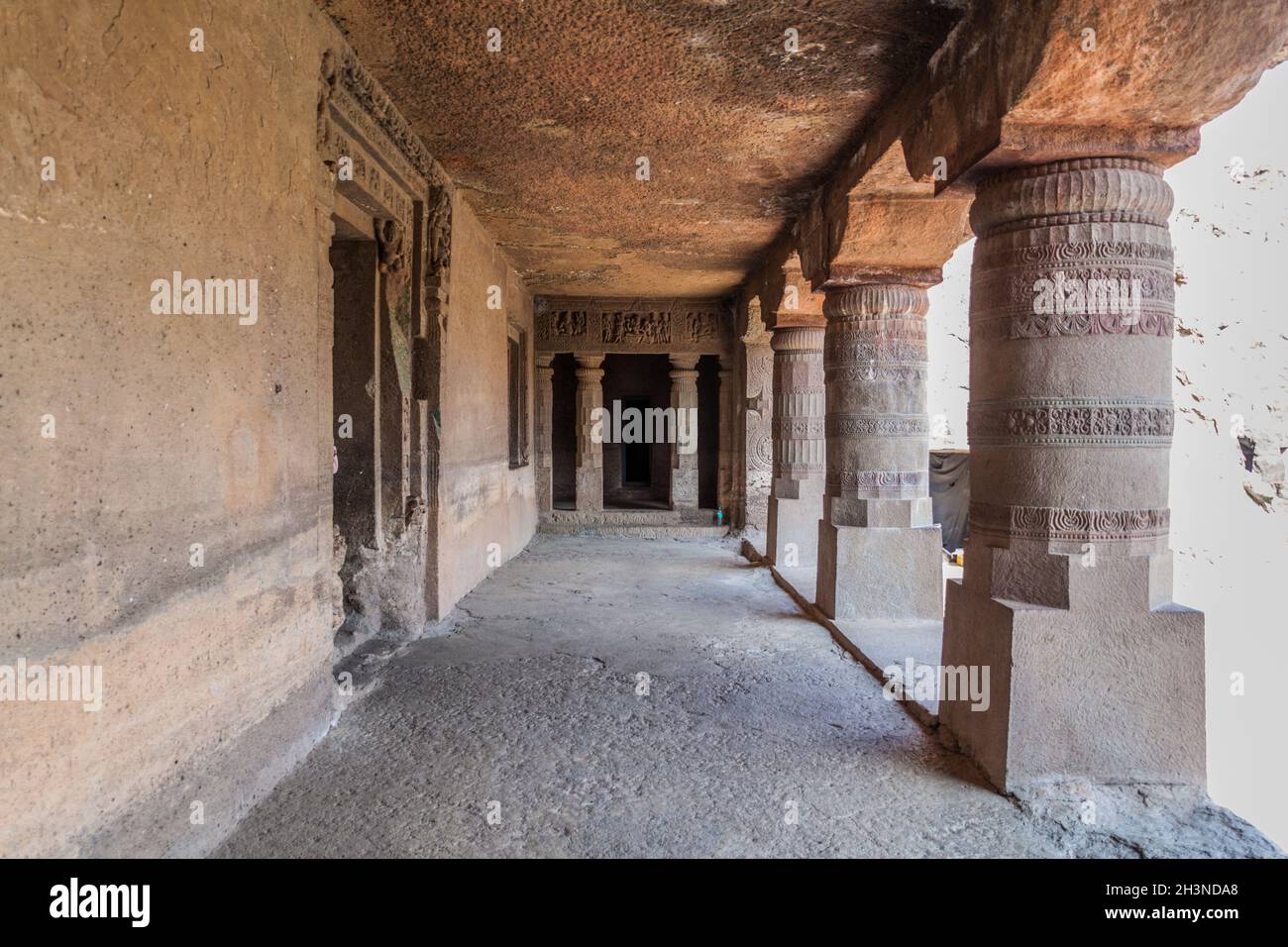 AJANTA, INDIA - FEBRUARY 6, 2017: Monastery vihara carved into a cliff ...