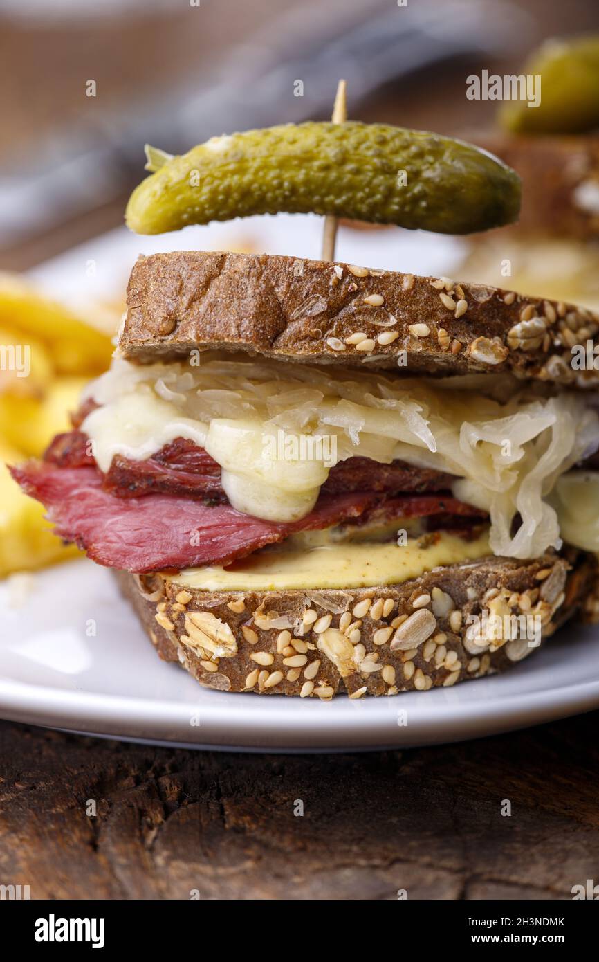 Reuben sandwich on rustic wood hi-res stock photography and images - Alamy