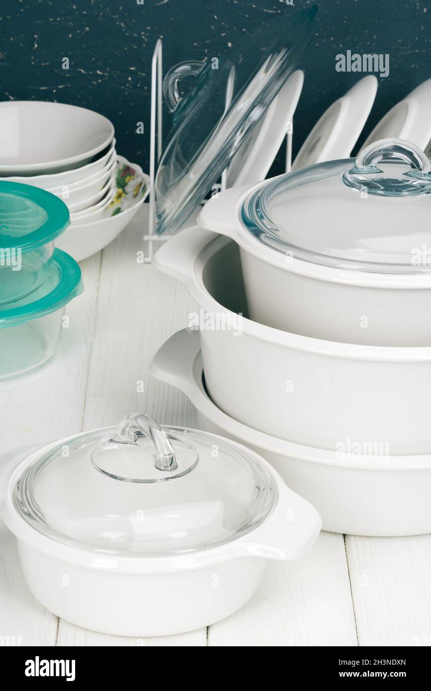 White pot cookware in a kitchen interior Stock Photo - Alamy