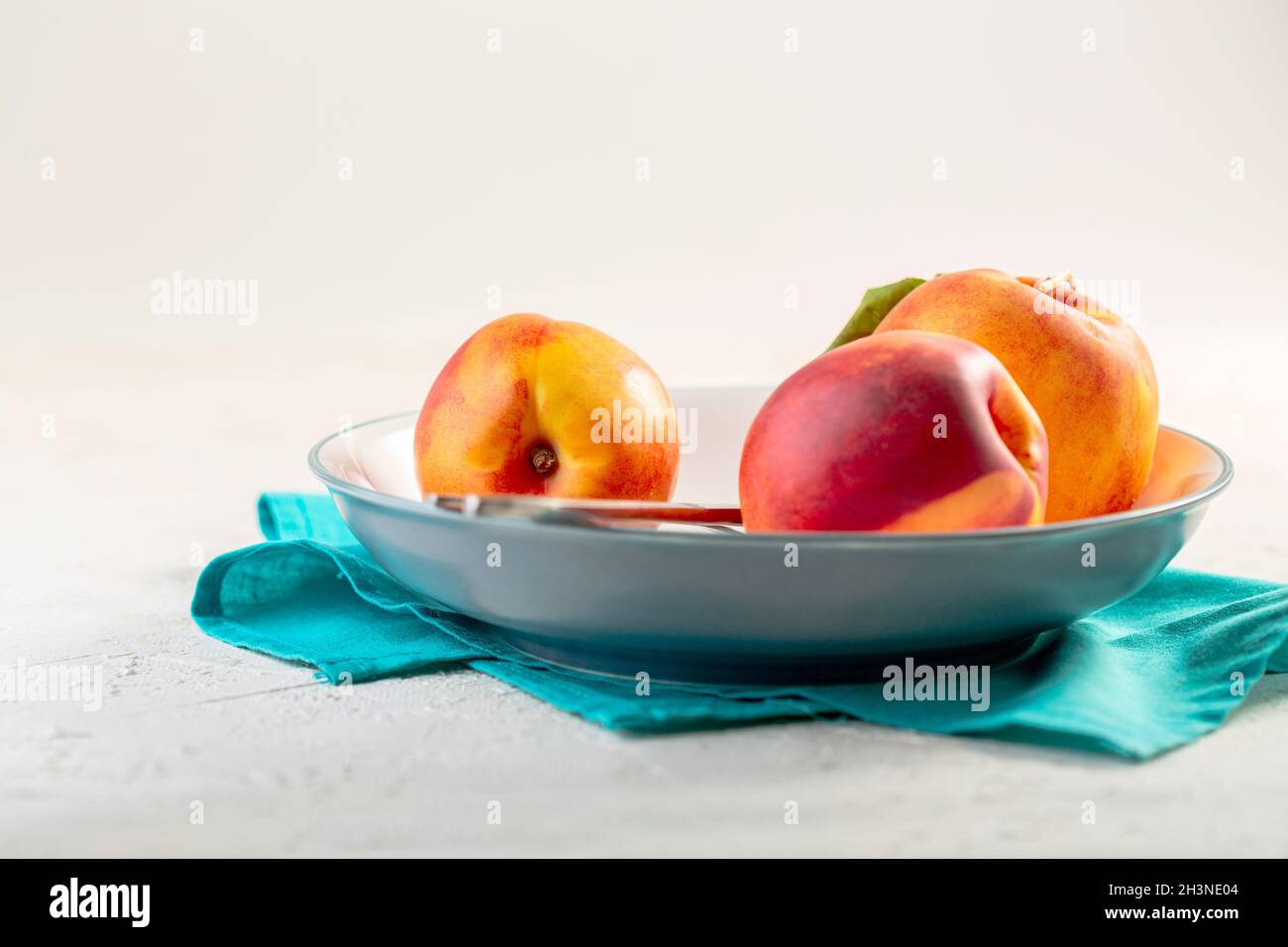 Three ripe nectarines. Concept of healthy eating Stock Photo - Alamy