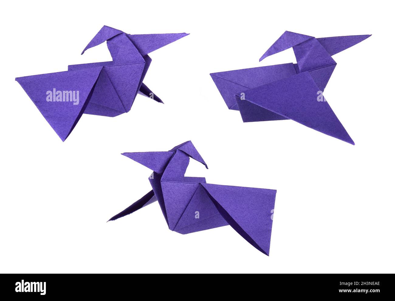 Colored blue origami paper pterodactyls over white background Stock ...