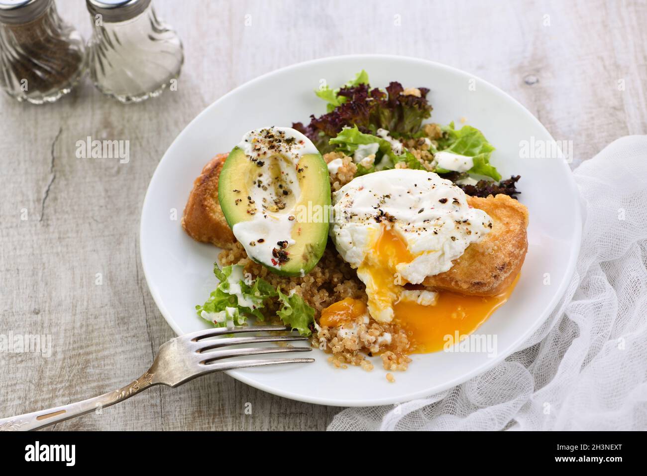 A healthy and balanced breakfast plate. Benedict's egg spreads on a ...