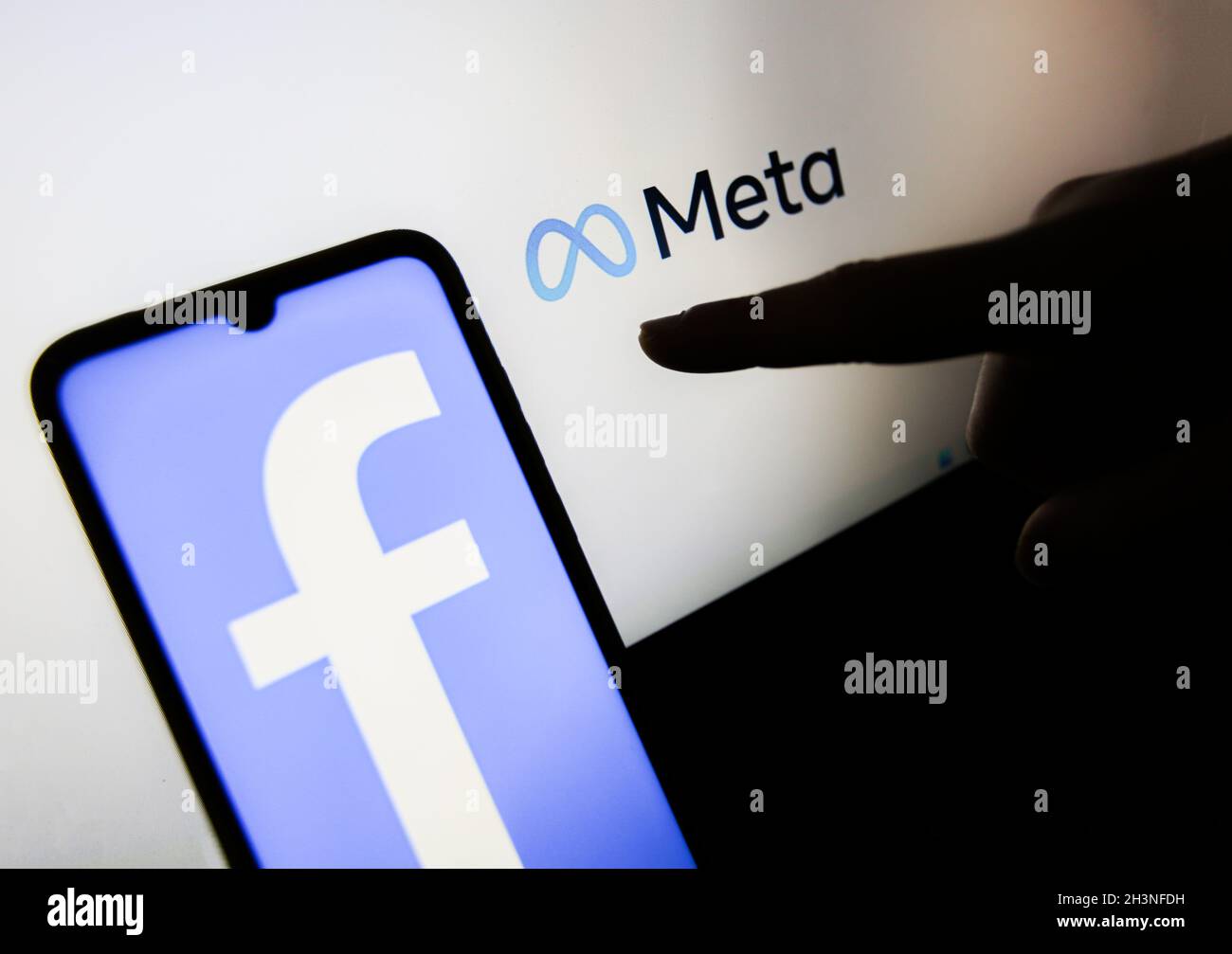In this photo illustration, a Facebook logo seen displayed on a ...