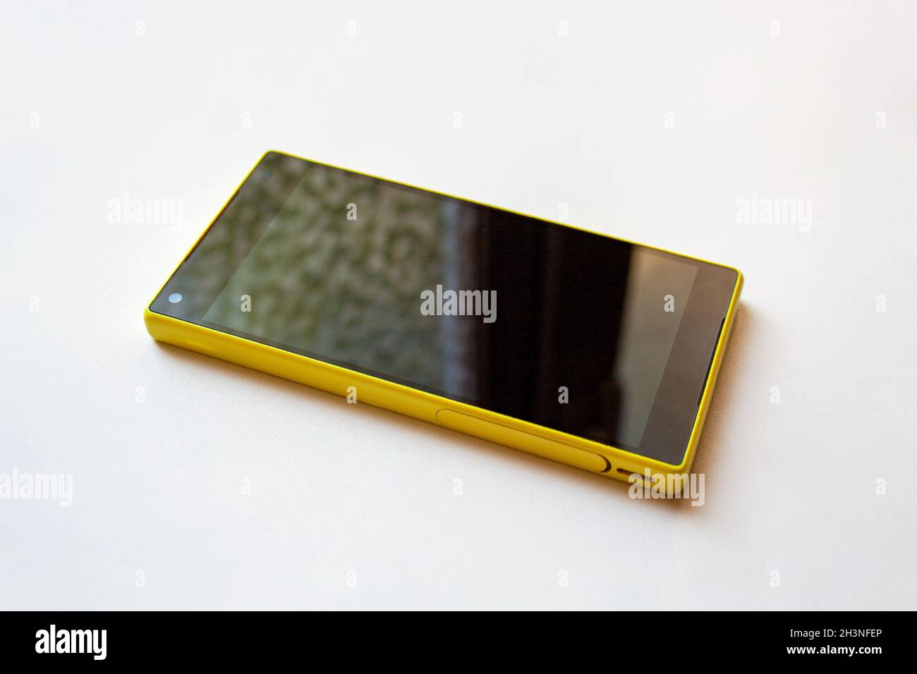 Bright yellow smartphone mockup isolated on white background Stock ...