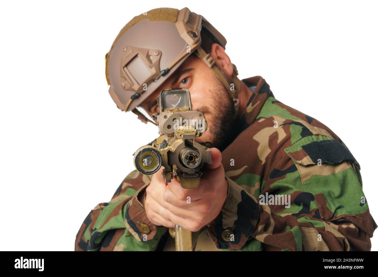 Airsoft player aiming with his rifle isolated on white Stock Photo - Alamy