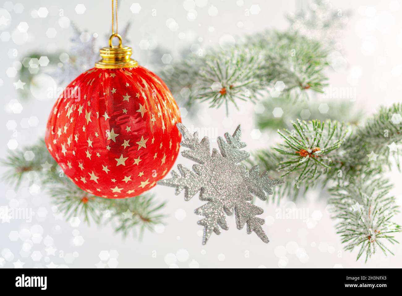 Christmas or winter background with a red ball Stock Photo - Alamy