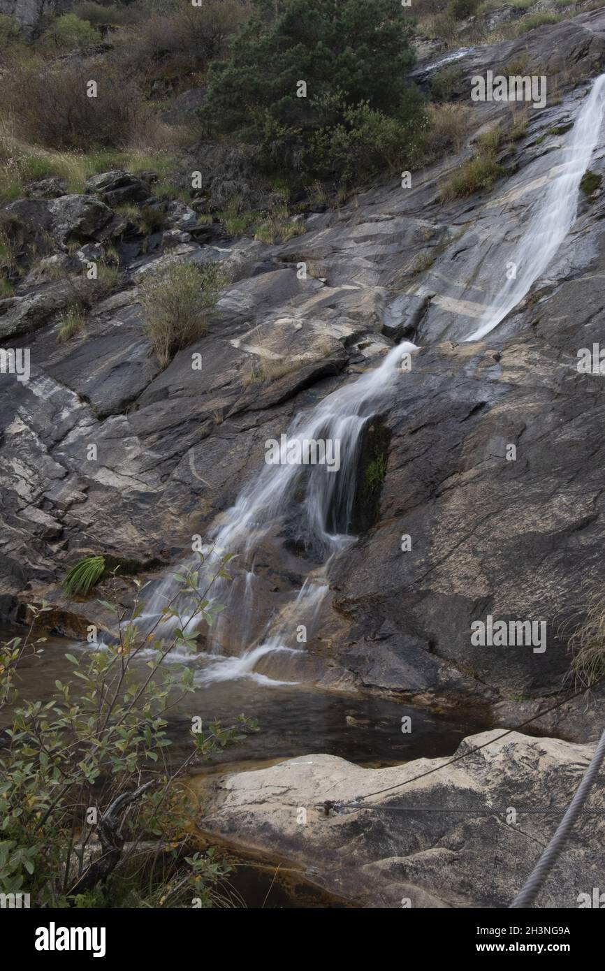 Beautiful view of the waterfall from the rocks Stock Photo - Alamy