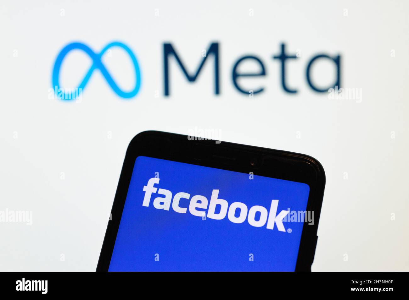 In this photo illustration the Facebook logo is displayed on a ...