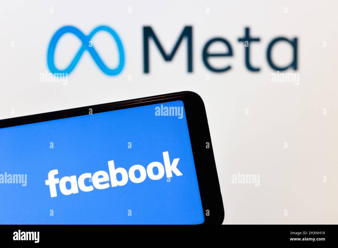 In this photo illustration the Facebook logo is displayed on a ...